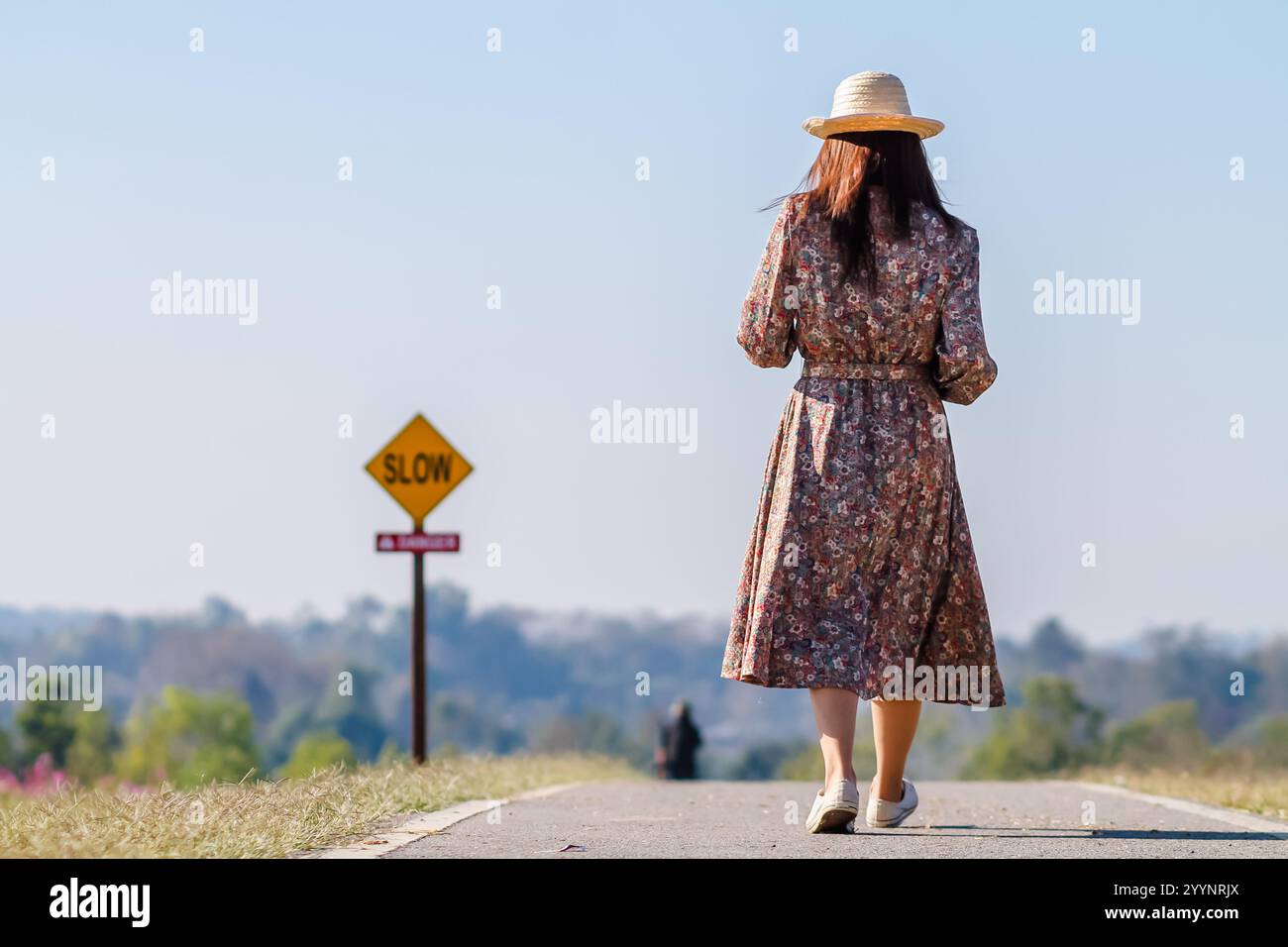 woman walking forward on the path to her intended destination and her ...