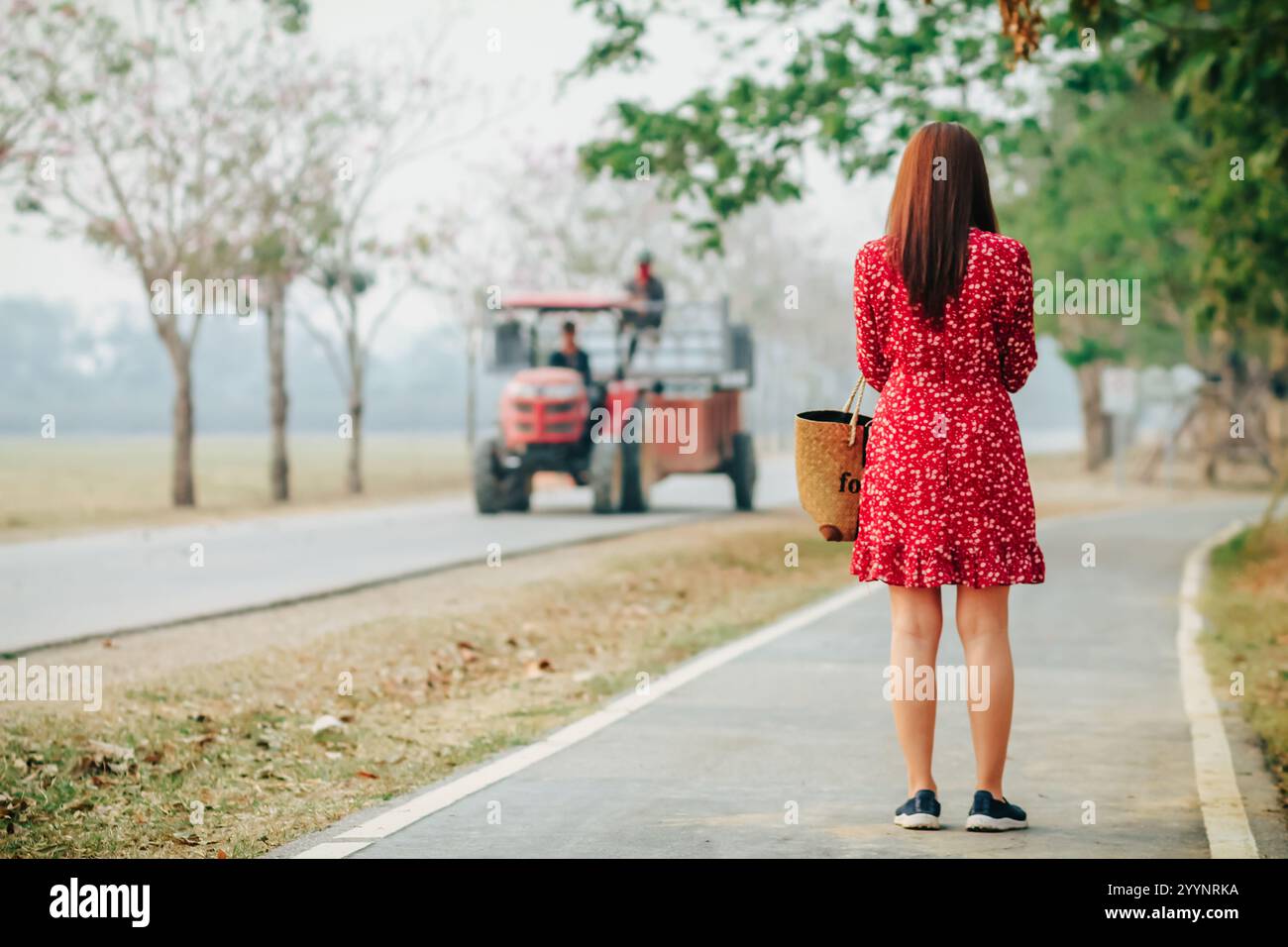 woman walking forward on the path to her intended destination and her ...