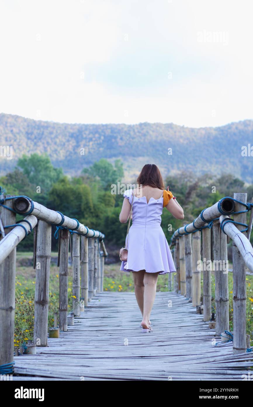 woman walking forward on the path to her intended destination and her ...