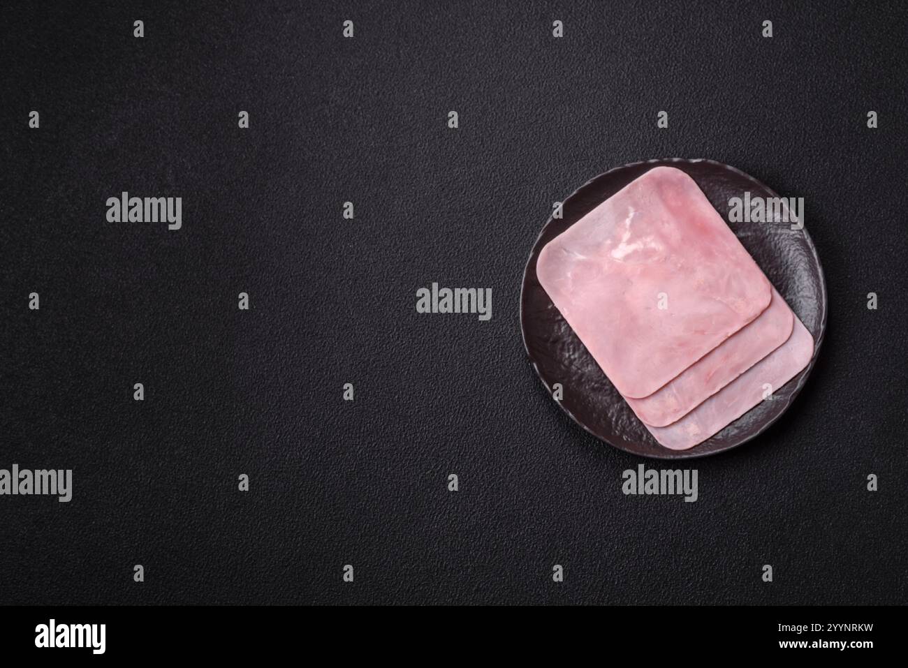 Ham cut into square slices for making delicious nutritious sandwiches ...