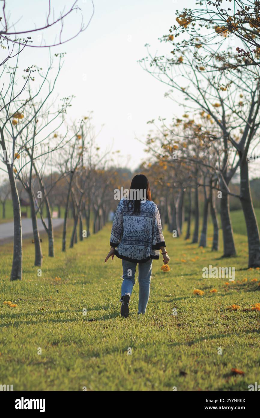woman walking forward on the path to her intended destination and her ...
