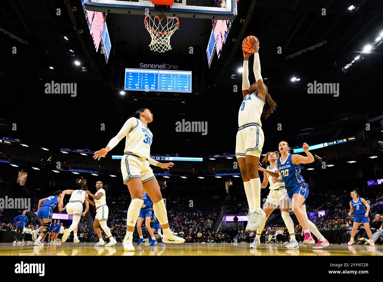 UCLA forward Janiah Barker (0) catches a rebound against Creighton ...
