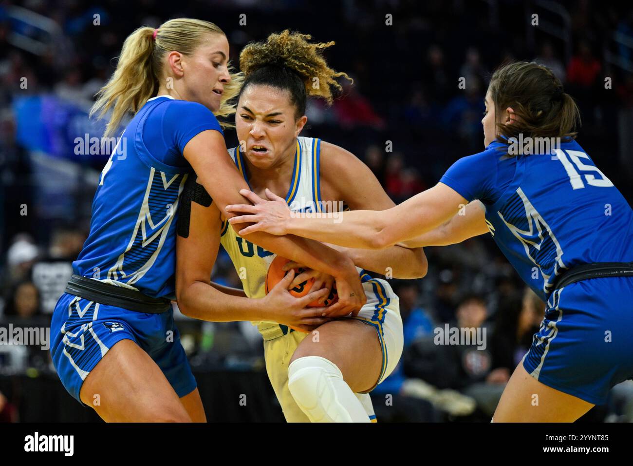 UCLA guard Kiki Rice (1) drives to the basket against Creighton forward ...