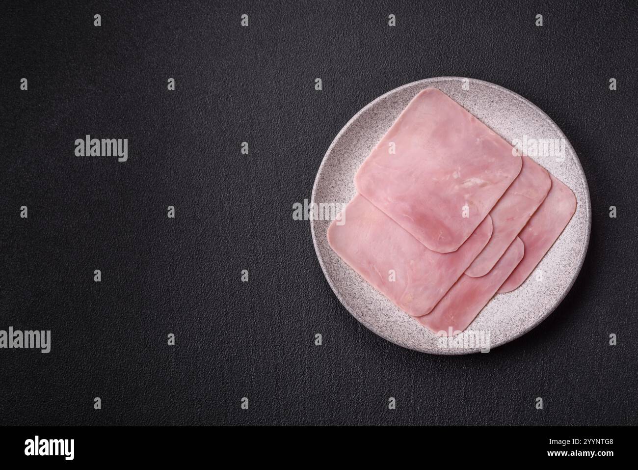 Ham cut into square slices for making delicious nutritious sandwiches ...