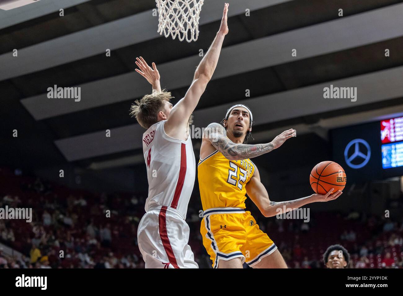 Kent State forward Anthony Morales (22) shoots with Alabama forward ...