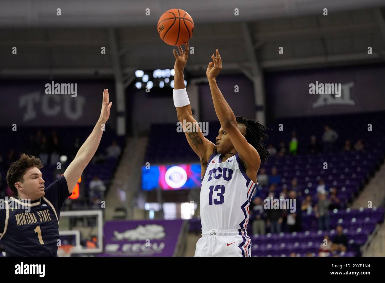 TCU forward Trazarien White (13) shoots against Montana State guard ...