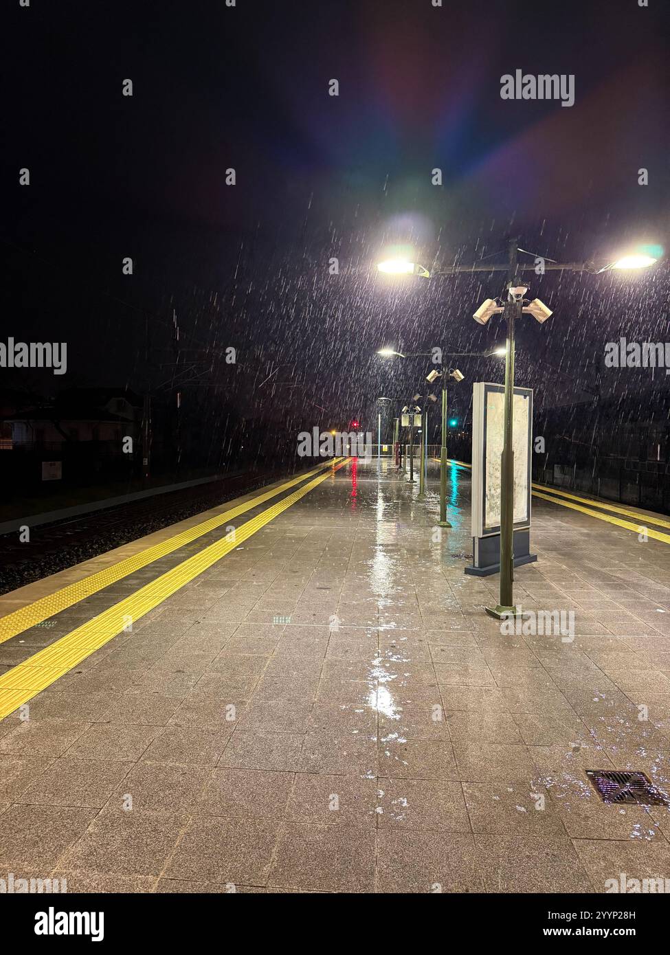 Rainy Train Station empty at night illuminated. Ready to use Stock ...