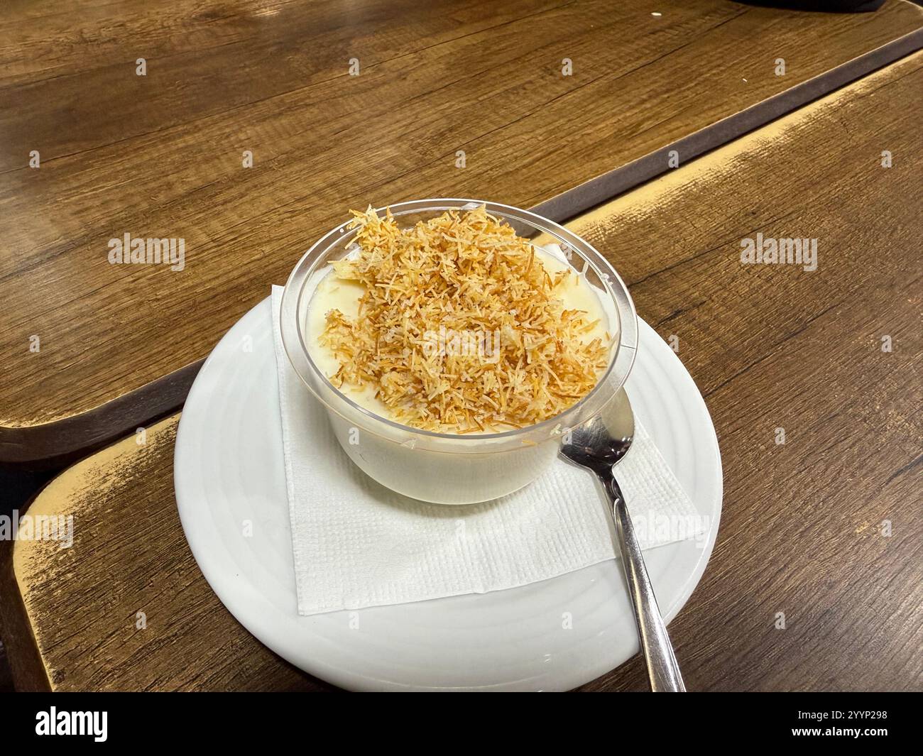 Traditional milky crispy Ramadan dessert custard pudding with roasted ...