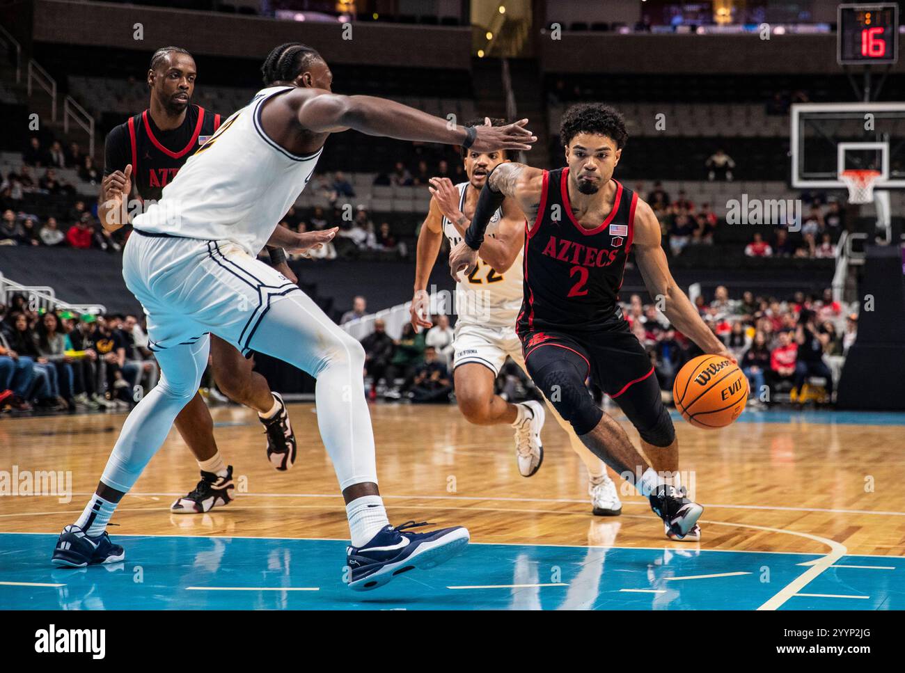 December 21 2024 San Jose, CA U.S.A. San Diego State guard Nick Boyd (2)goes to the hoop during ...
