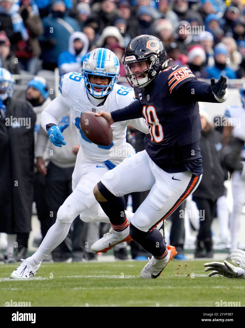 Chicago Bears quarterback Caleb Williams carries the ball as Detroit ...