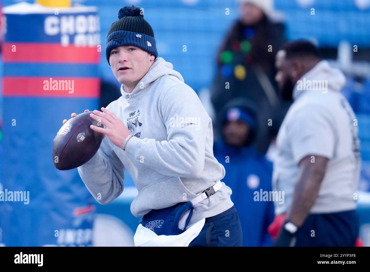 New England Patriots quarterback Drake Maye warms up before playing ...