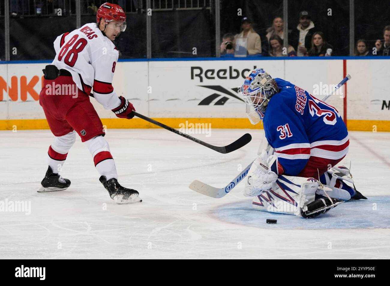 New York Rangers goaltender Igor Shesterkin (31) stops a shot by ...