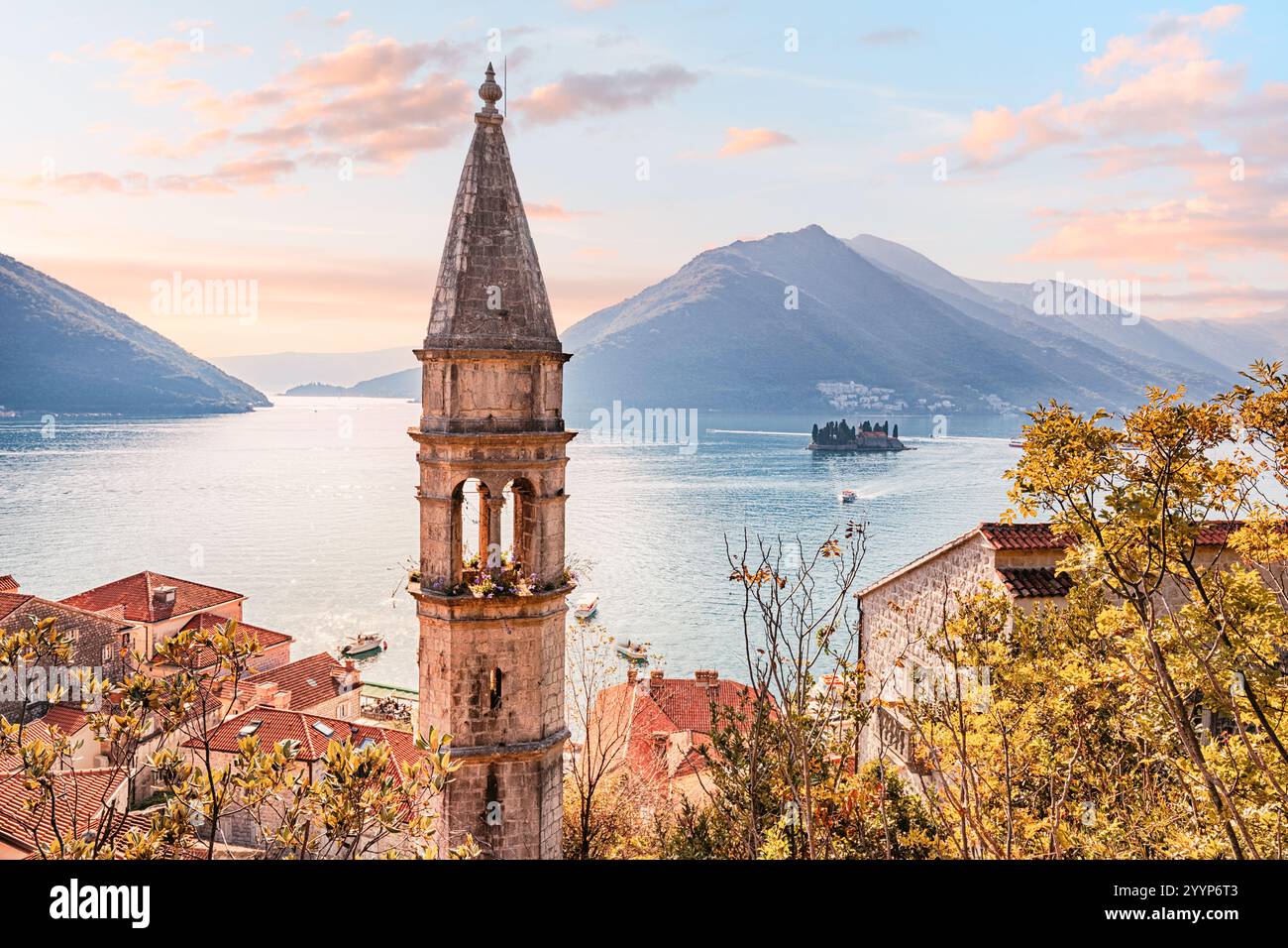 Scenic view of our lady of the rocks island and church tower in Perast ...