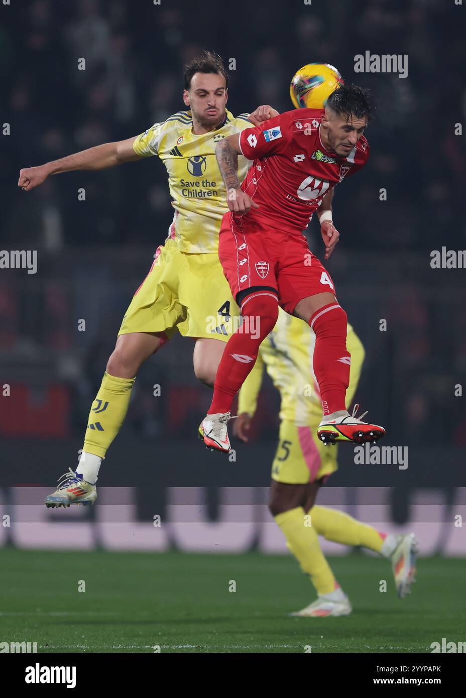 Monza, Italy. 22nd Dec, 2024. Federico Gatti of Juventus battles for an ...