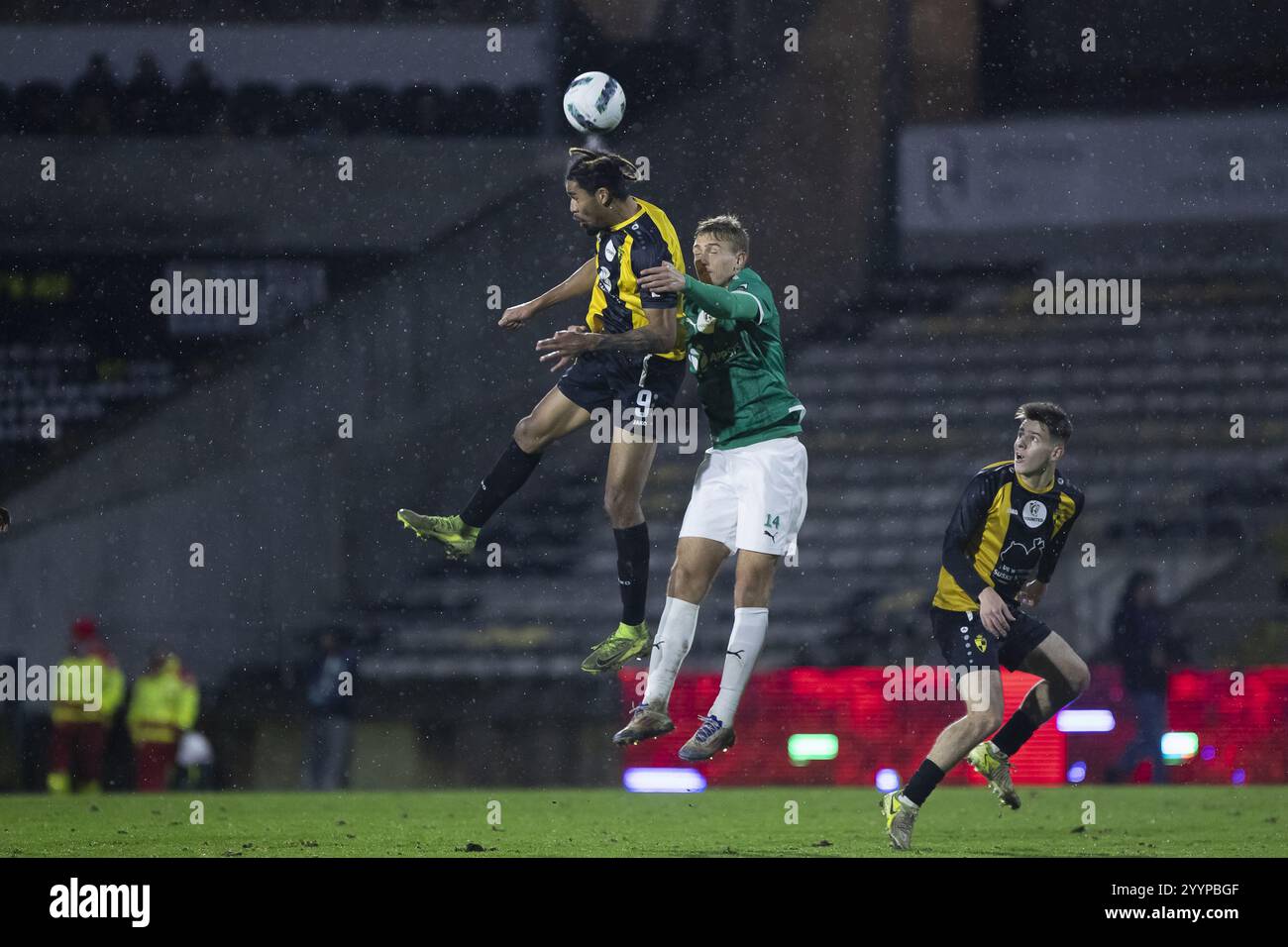 Lier, Belgium. 22nd Dec, 2024. Lierse's Bryan Adinany and Lommel's ...