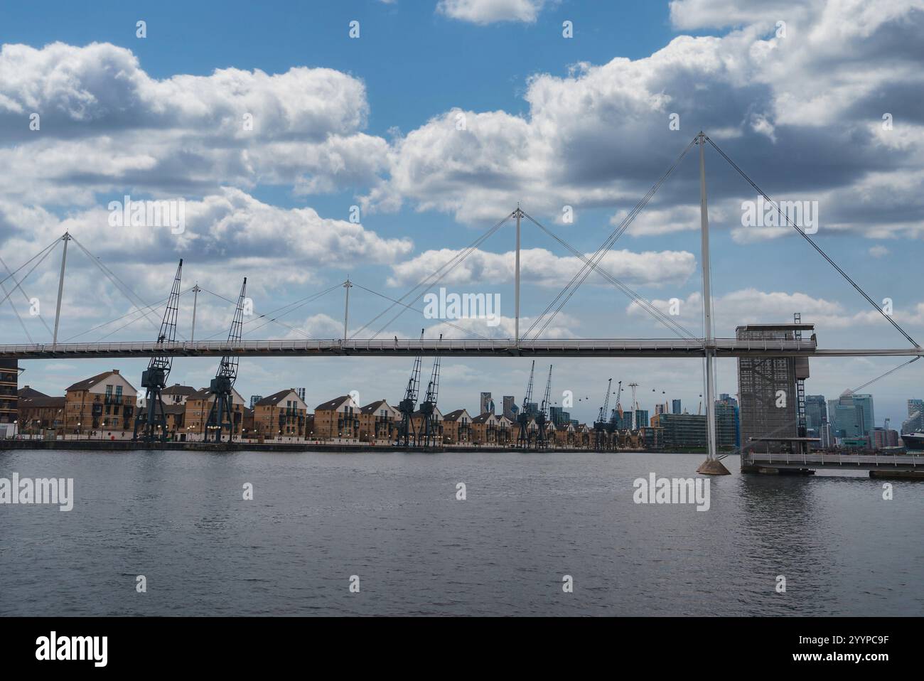 The image captures the Emirates Air Line cable cars over Royal Victoria ...