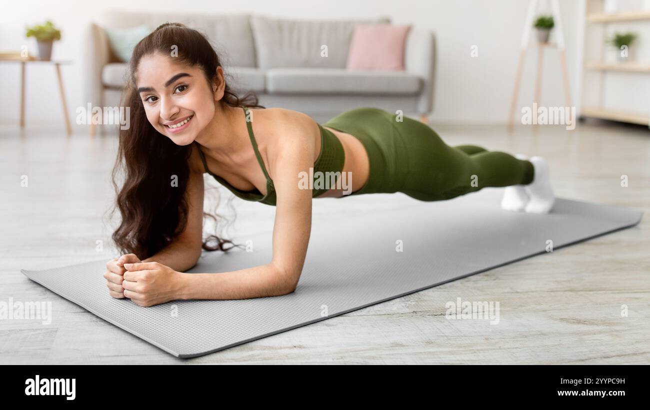 Young indian woman plank exercise hi-res stock photography and images ...
