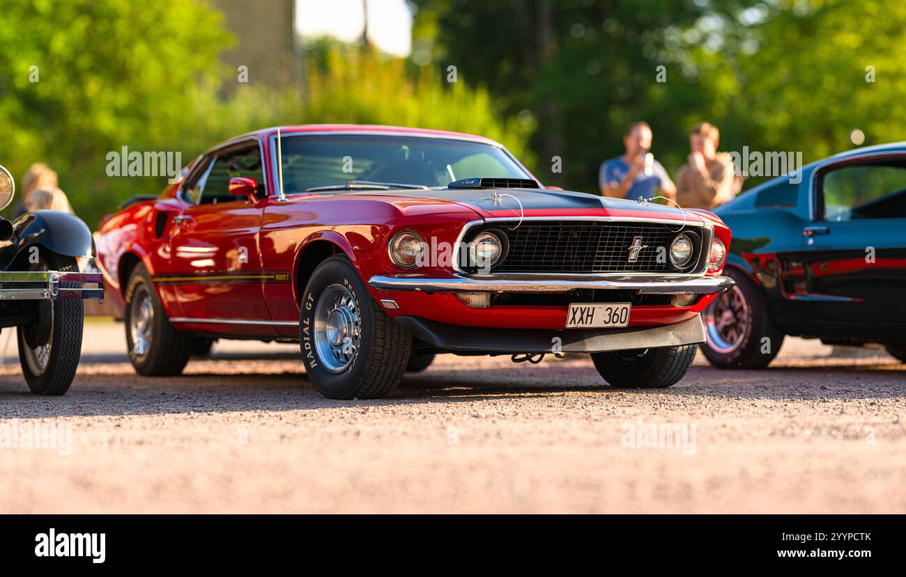 Kungälv, Sweden - July 25 2024: Red 1969 Ford Mustang Mach 1 on display ...