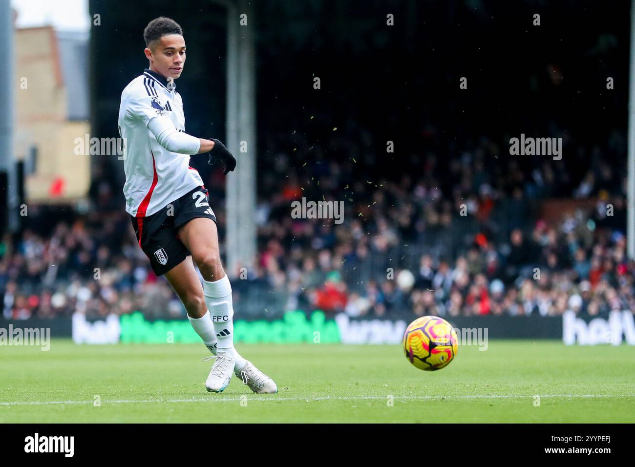 London, UK. 22nd Dec, 2024. Joshua King of Fulham passes the ball ...
