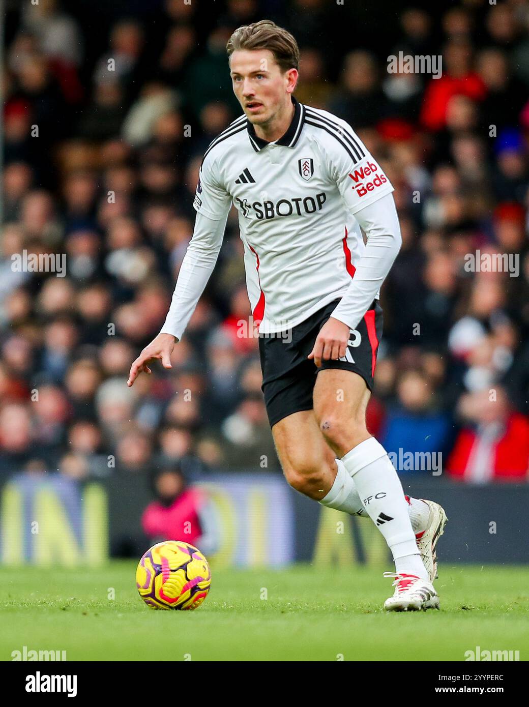 London, UK. 22nd Dec, 2024. Sander Berge of Fulham runs with the ball ...