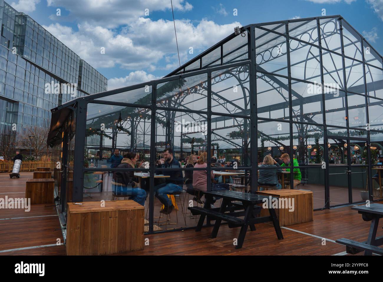 Modern Glass Enclosed Rooftop Dining Area in Urban London Setting Stock ...