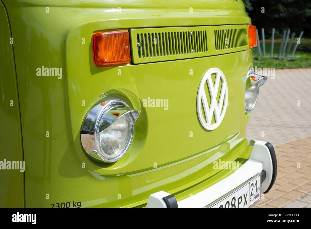 Front view of the hood of a green retro Volkswagen Kombi (T2) bus ...