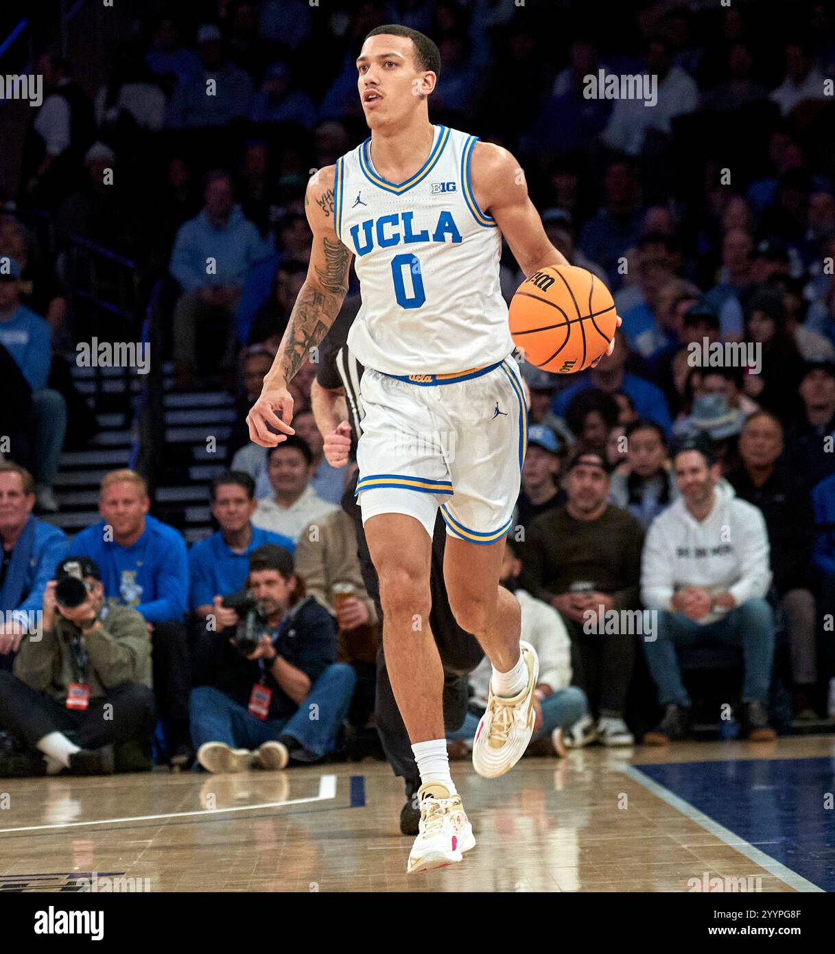 UCLA Bruins guard Kobe Johnson (0) brings the ball up court against the ...