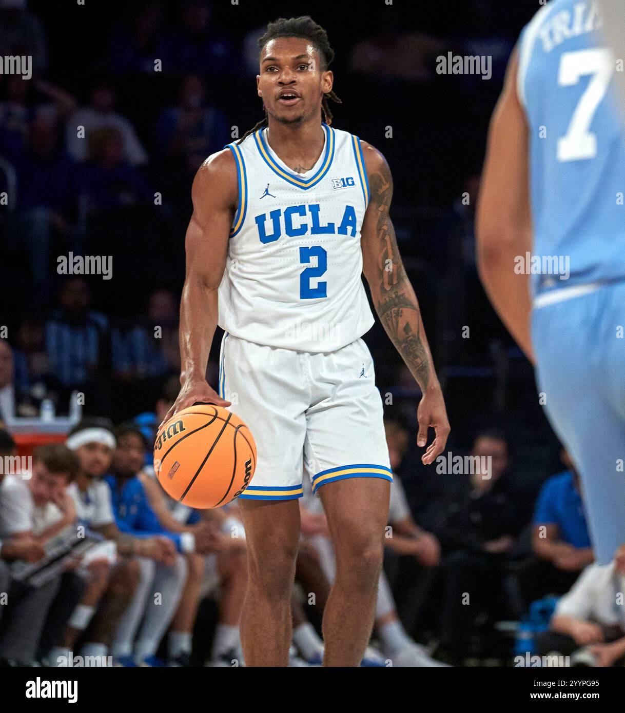 UCLA Bruins guard Dylan Andrews (2) brings the ball up court against ...