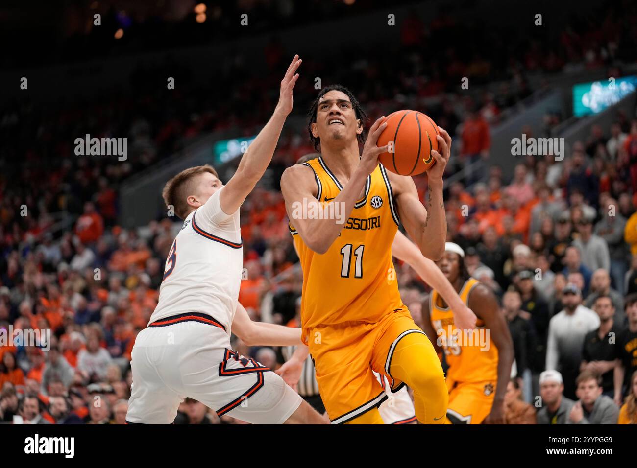 Missouri's Trent Pierce heads to the basket past Illinois' Ben ...