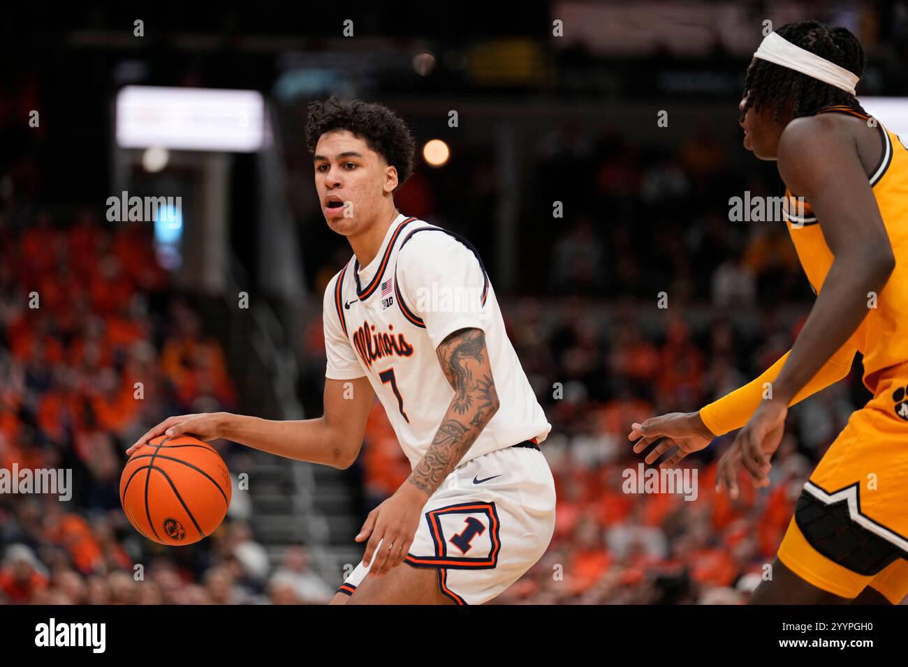 Illinois' Will Riley dribbles during the first half of an NCAA college ...