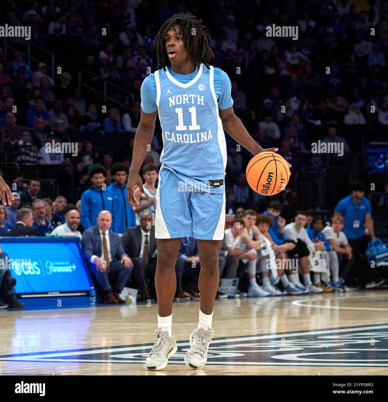 North Carolina Tar Heels guard Ian Jackson (11) brings the ball up ...