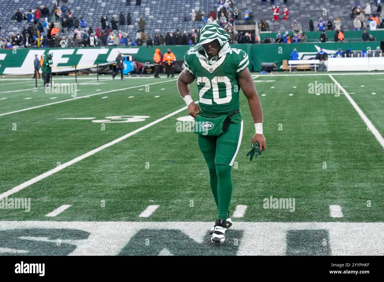 New York Jets running back Breece Hall (20) walks off the field after ...