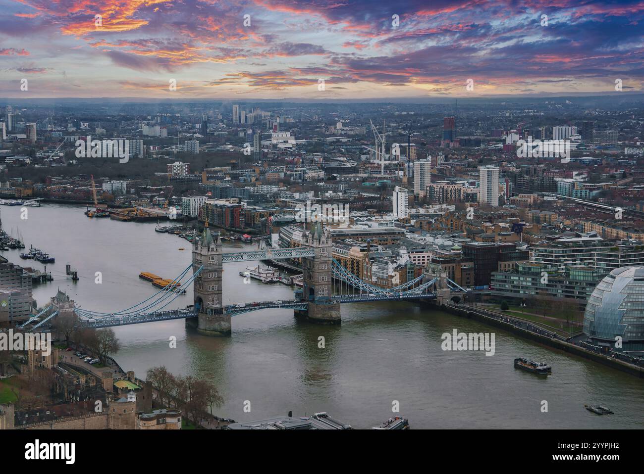An aerial view of London features Tower Bridge over the River Thames at ...