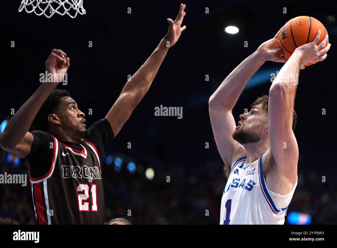 = during the first half of an NCAA college basketball game, Sunday, Dec ...