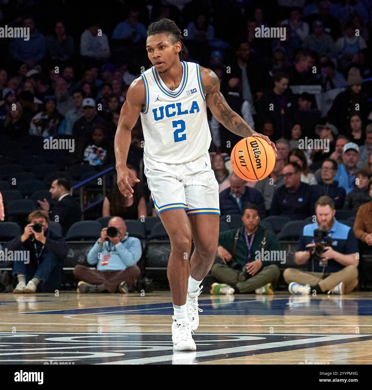 New York, United States. 22nd Dec, 2024. UCLA Bruins guard Dylan ...