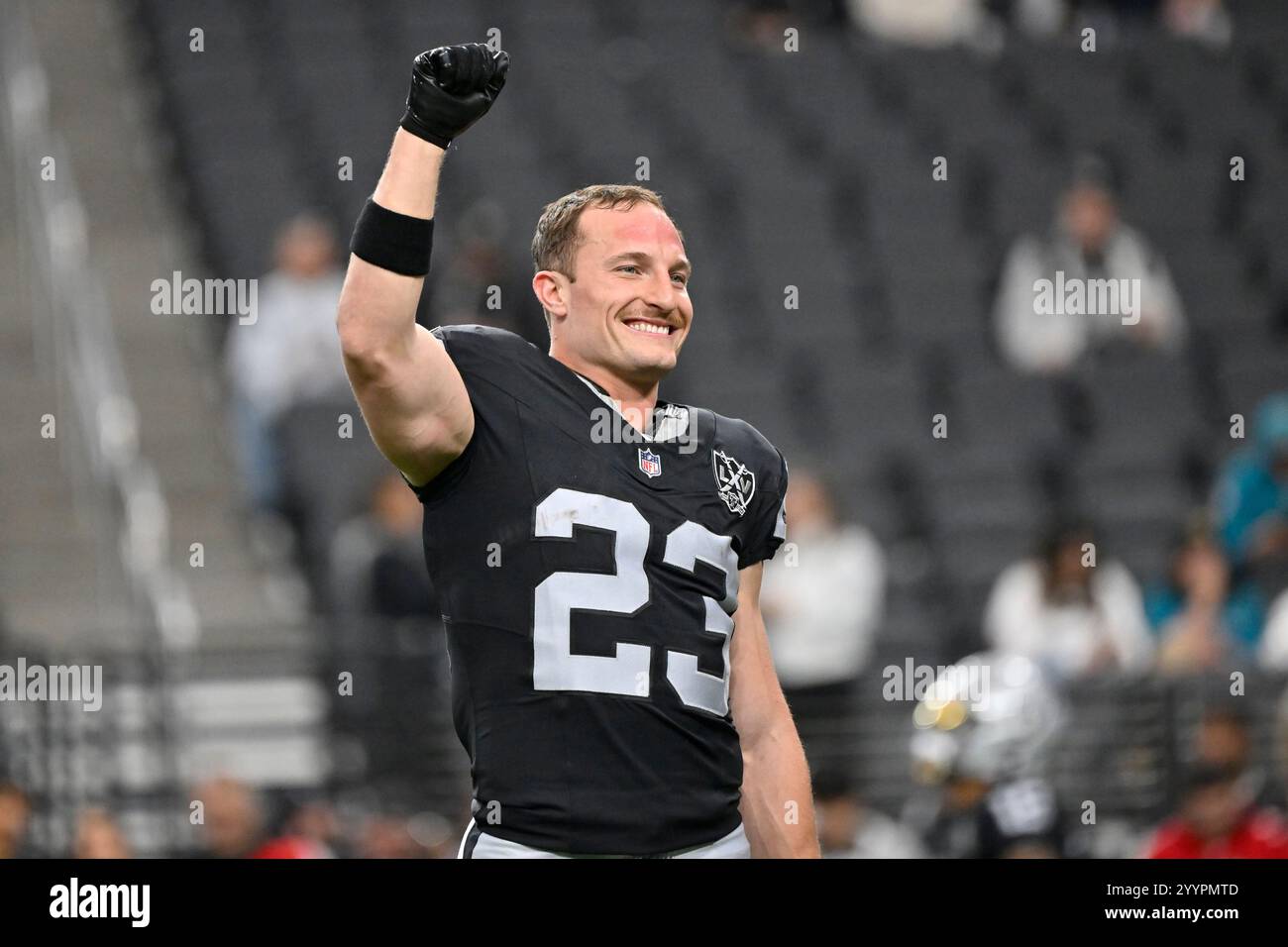 Las Vegas Raiders running back Dylan Laube smiles as he pauses on the ...