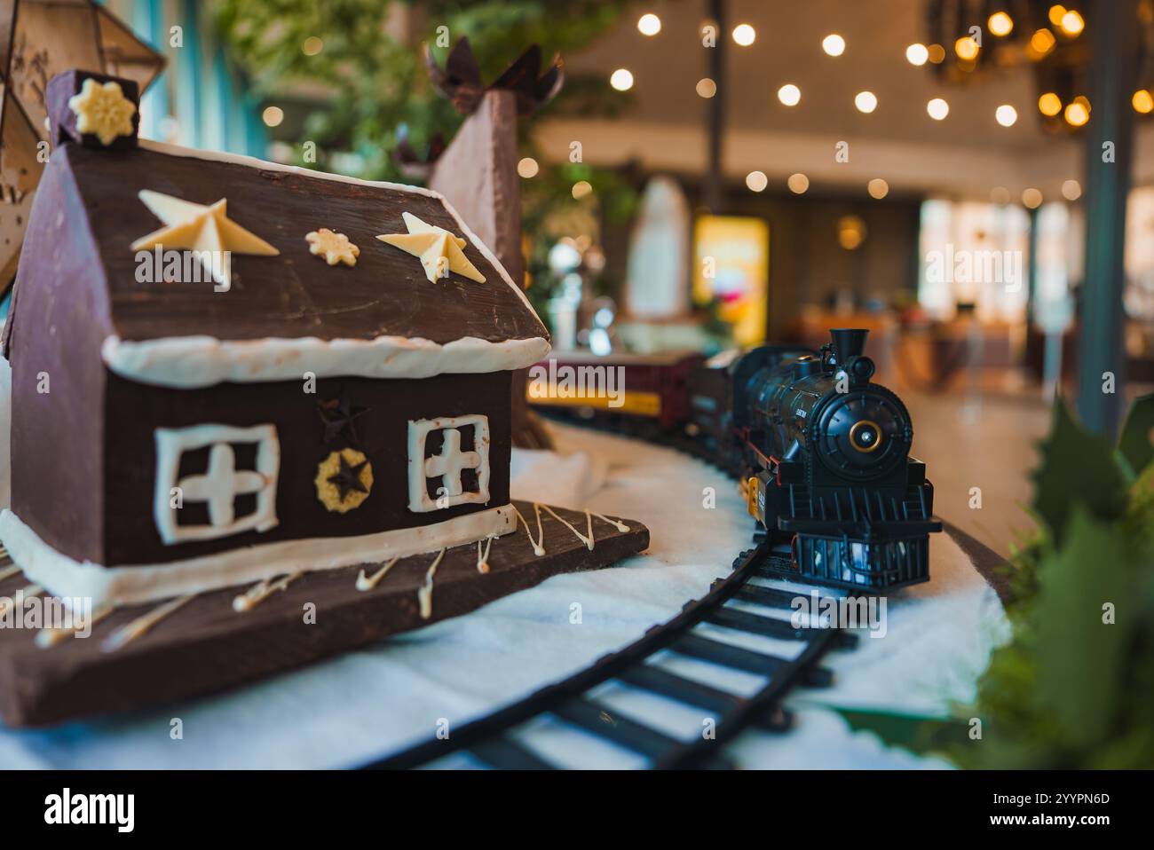 Gingerbread House with Train in Festive Holiday Display in London Stock ...
