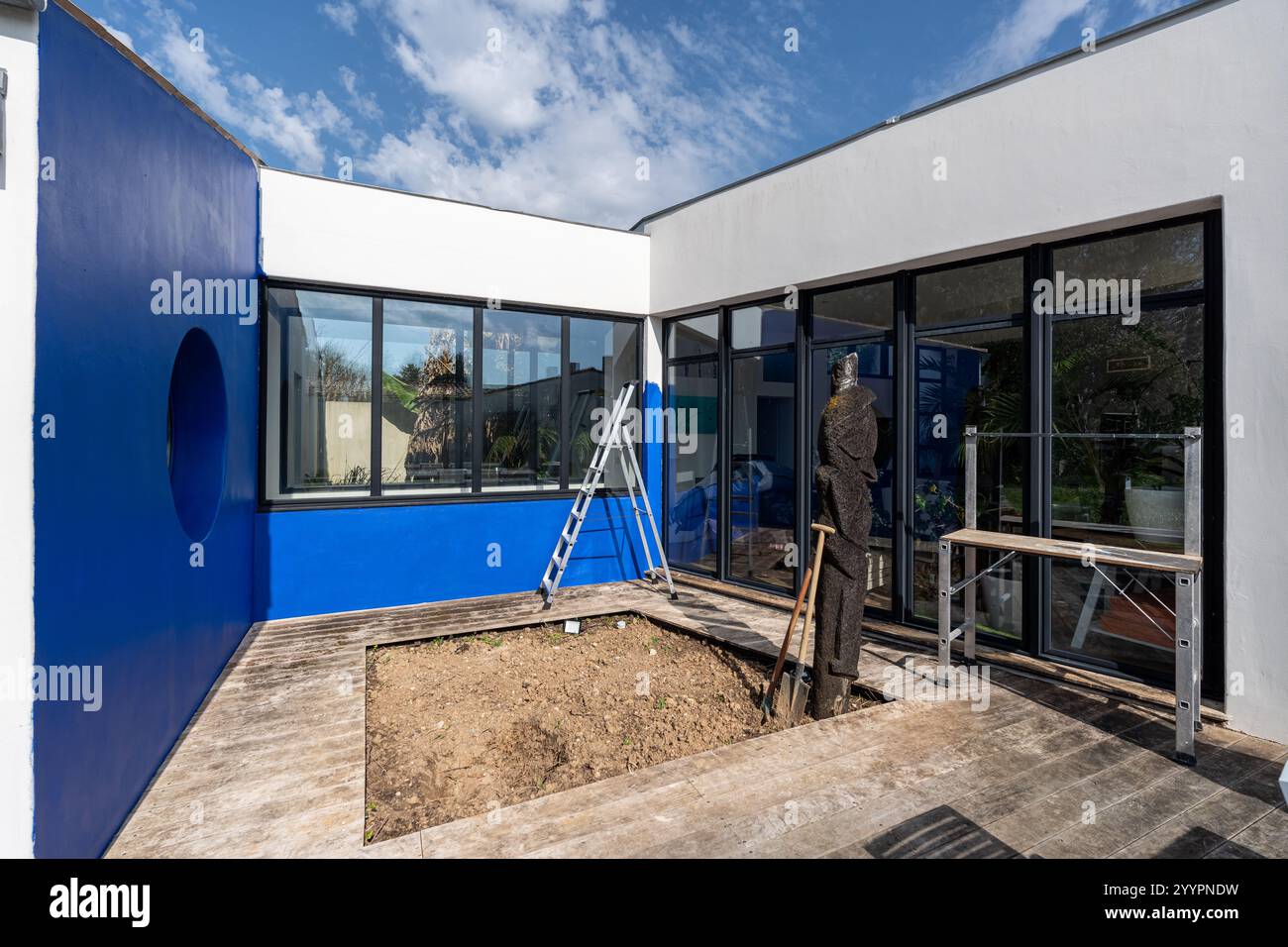 blue paint job on a modern house. blue House With Creative Colorful ...