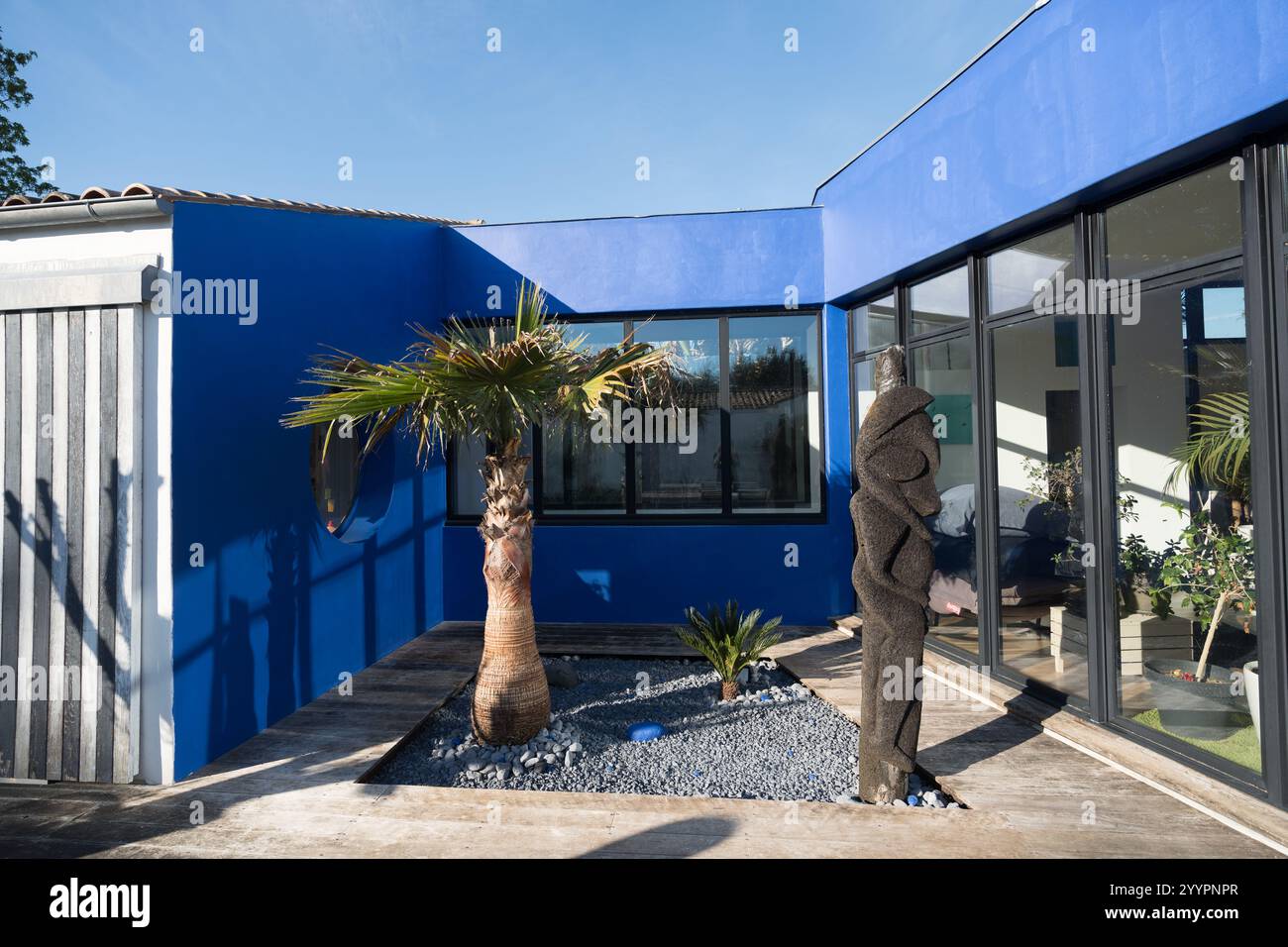 blue paint job on a modern house. blue House With Creative Colorful ...