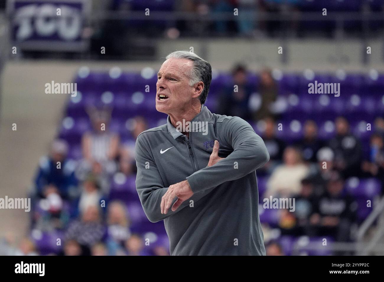 TCU head coach Jamie Dixon yells from the sidelines during the second ...