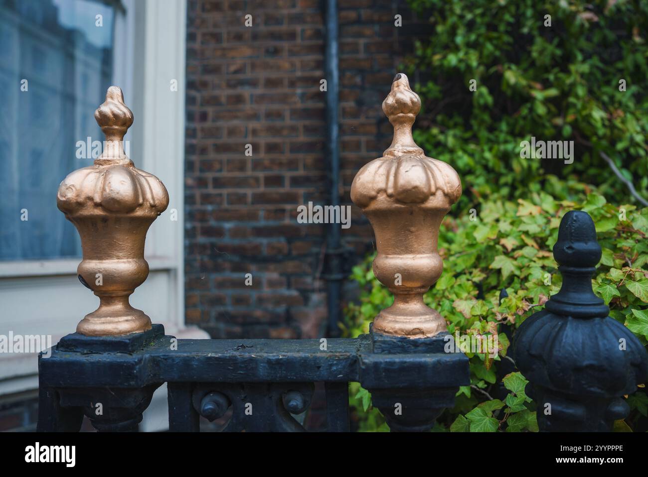 Ornate Gold Finials on Wrought Iron Fence in London Setting Stock Photo ...