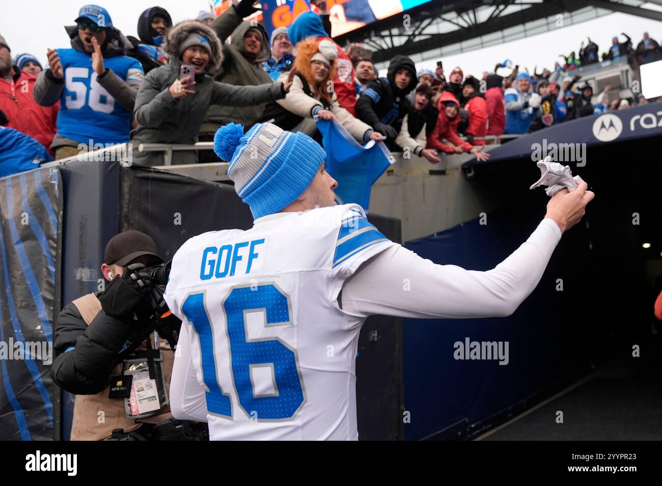 Detroit Lions quarterback Jared Goff tosses his gloves to fans after ...
