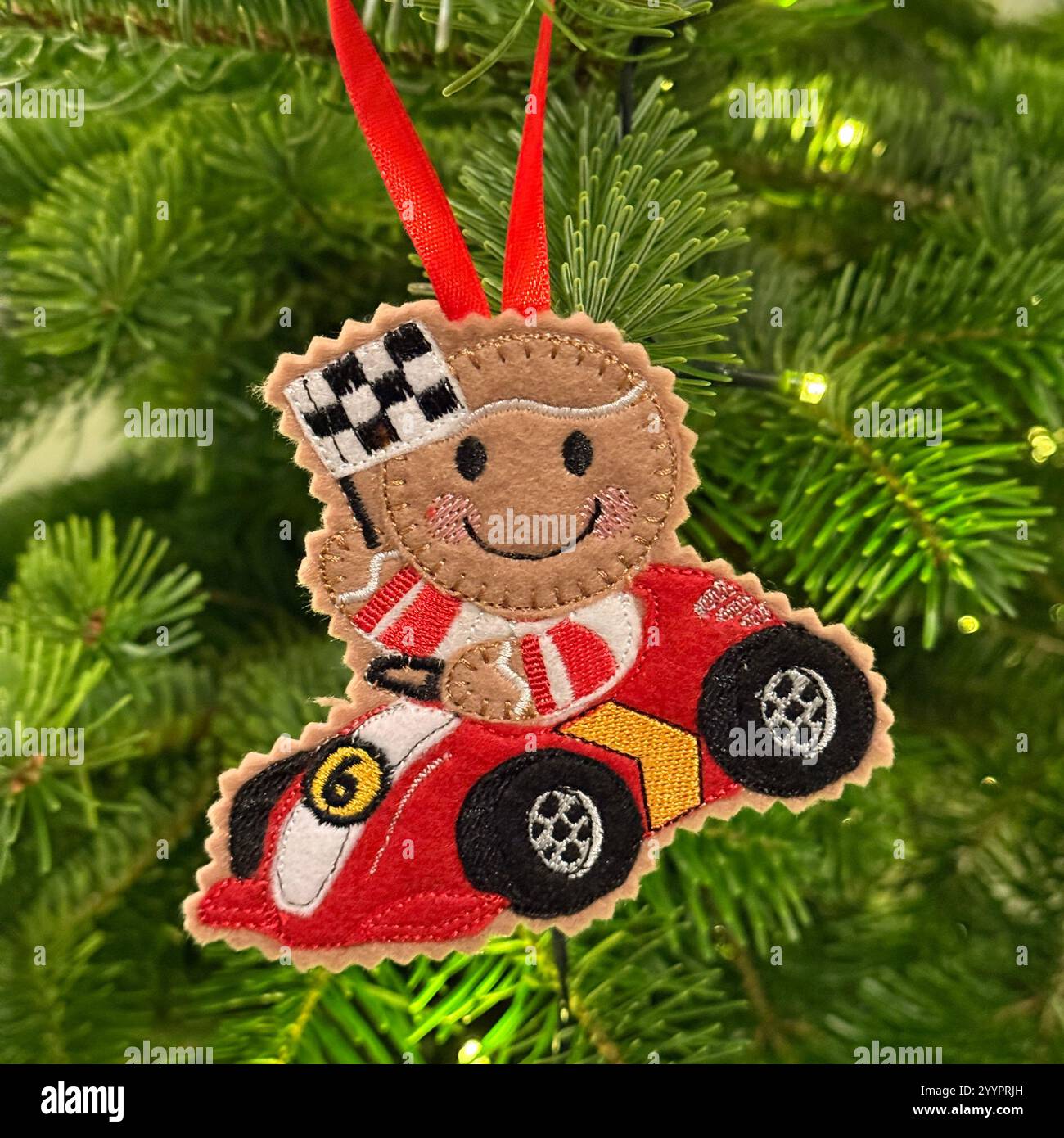 Christmas tree decoration, F1 (Formula One) driver gingerbread man in a ...