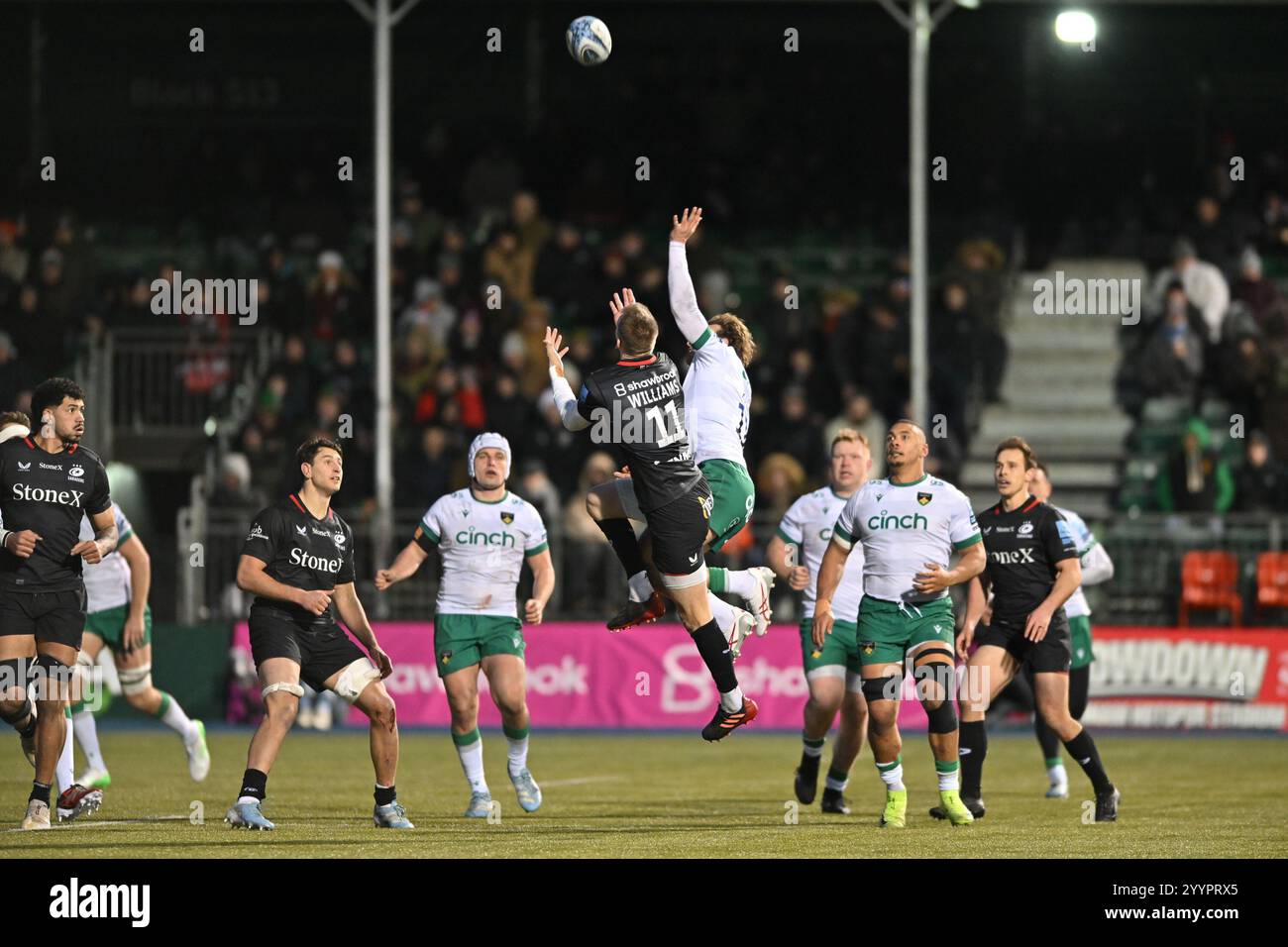 Liam Williams of Saracens and James Ramm of Northampton Saints rise to ...
