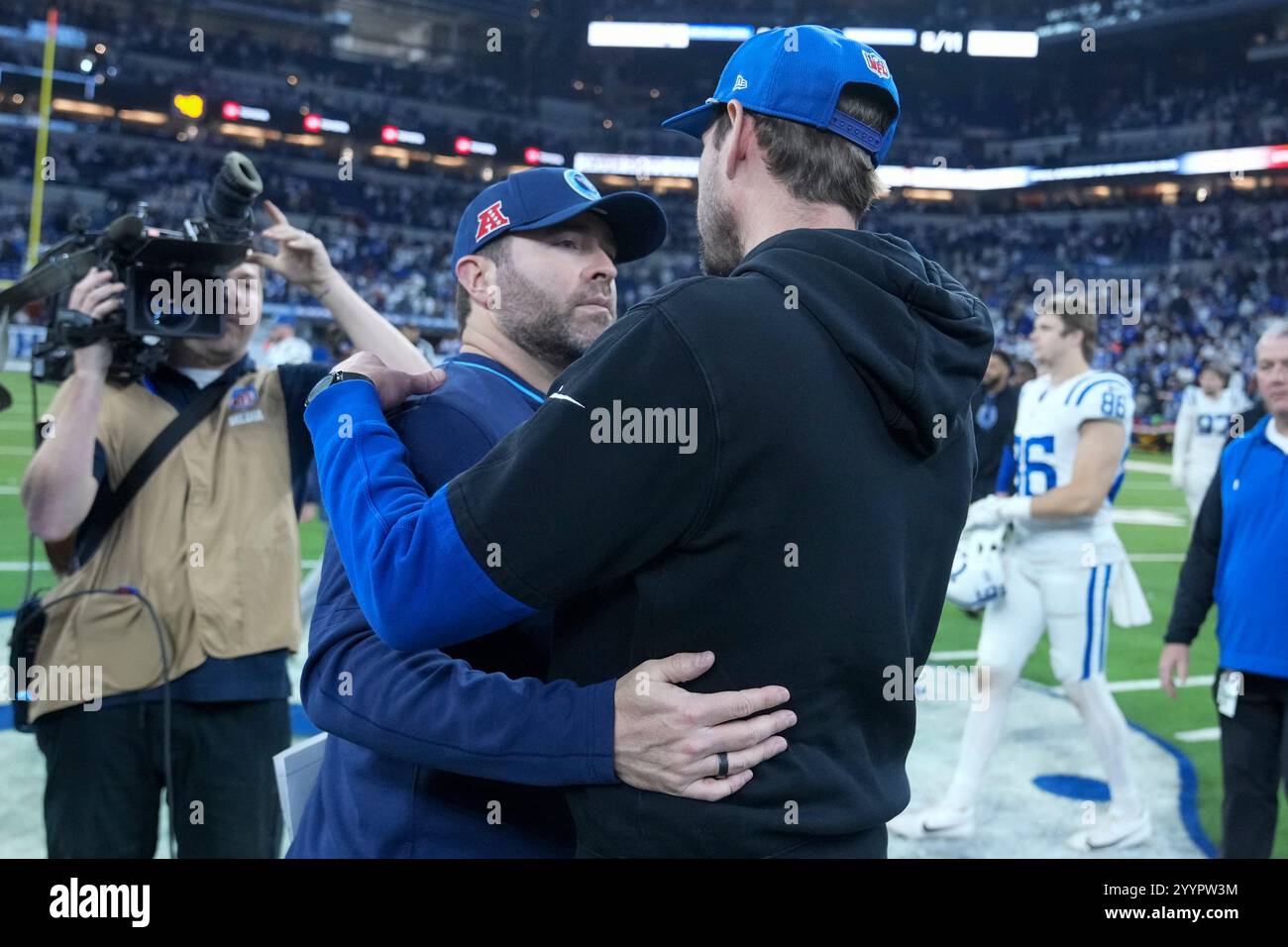 Tennessee Titans head coach Brian Callahan, left, hugs Indianapolis ...