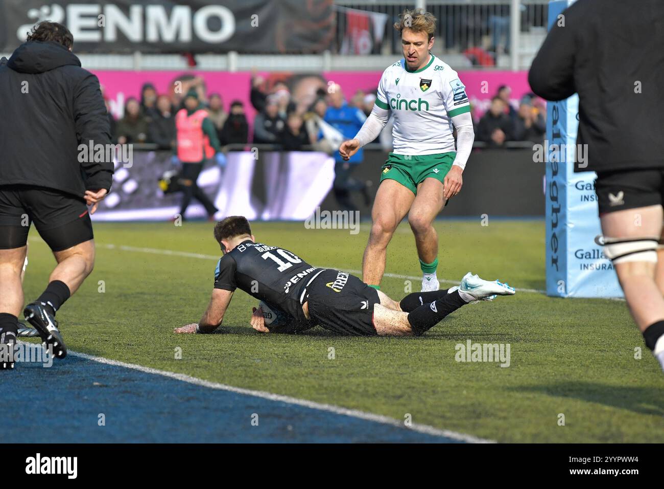 Fergus Burke of Saracens scores a try in the first half during the ...