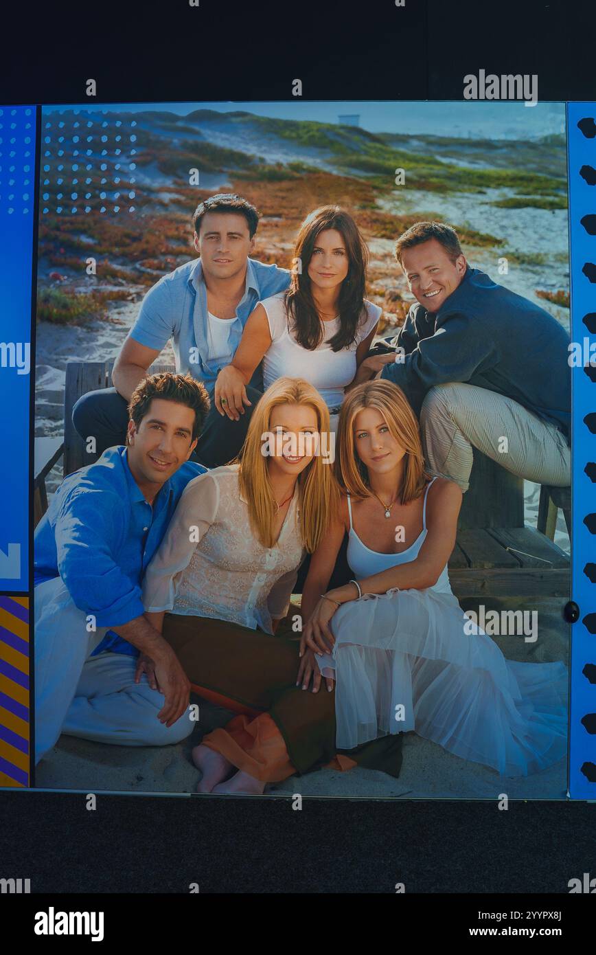 Promotional Poster of Friends Cast on a Sandy Beach in London Stock ...