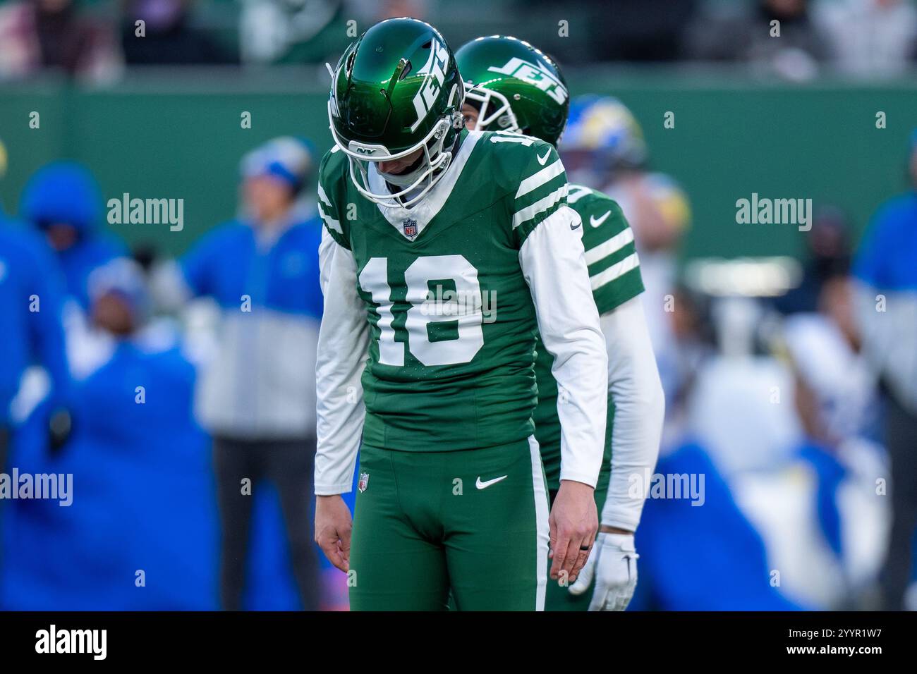 New York Jets kicker Anders Carlson (18) drops his head after missing ...