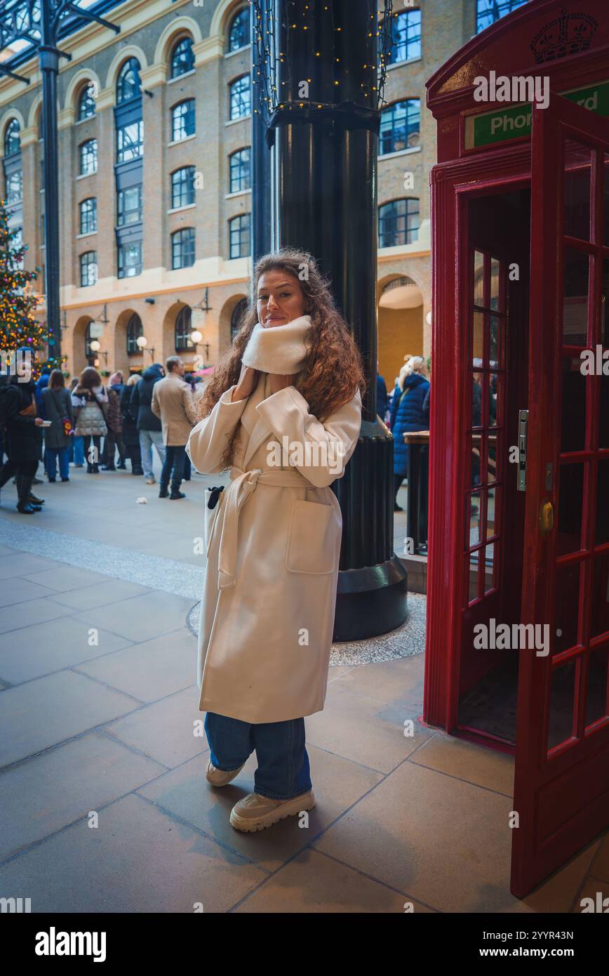 Festive Scene in London with Red Telephone Booth and Christmas Tree ...