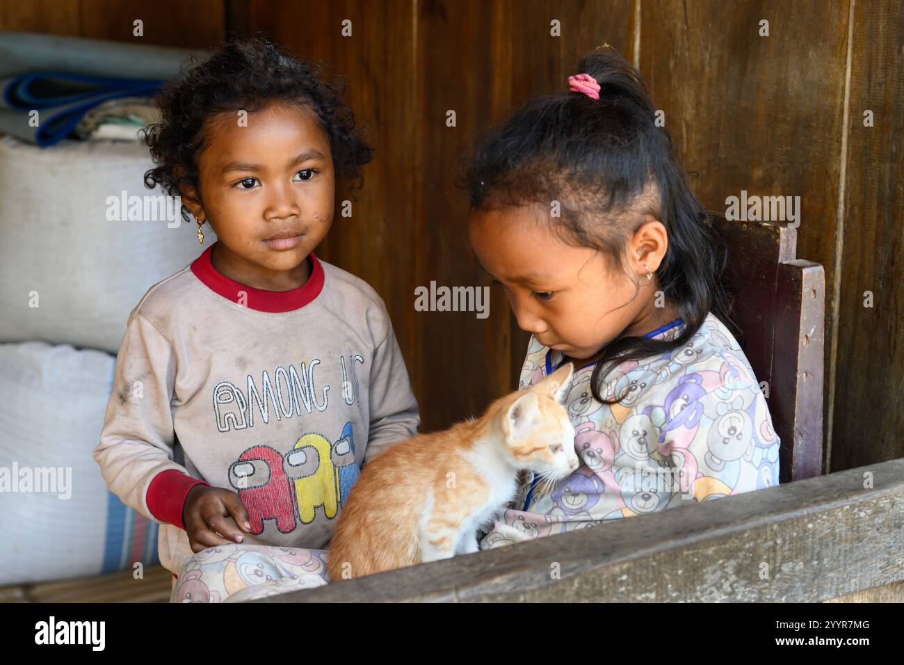 Luba Village, Flores, Indonesia - October 31 2024: Two Young Girls on a ...